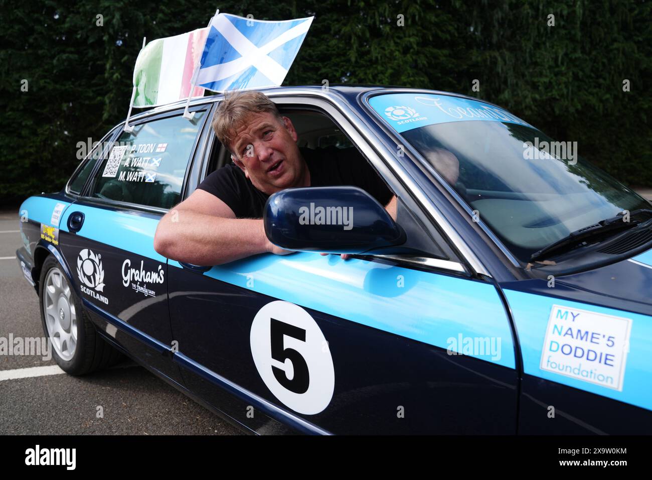 Alan Watt former team mate of Doddie Weir with the Jaguar car as he ...