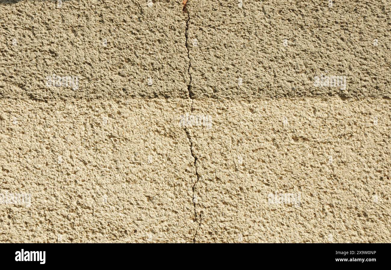 Plastered exterior wall of a house with a crack Stock Photo - Alamy