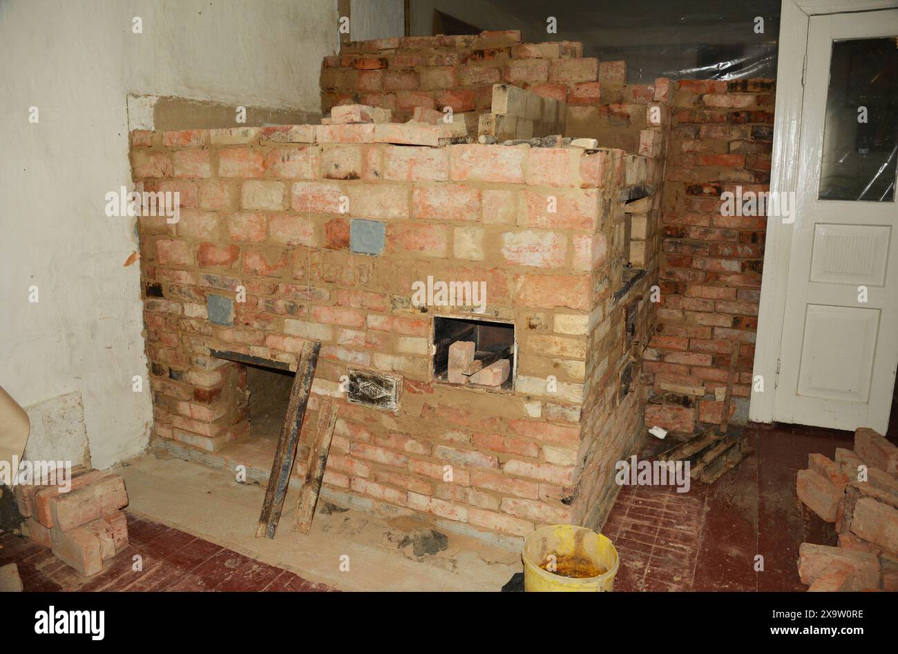 Building a traditional Russian brick oven in a country house. Russian ...