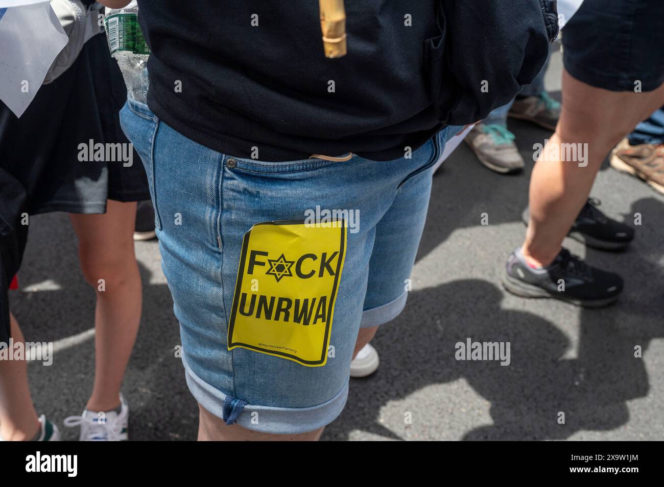 NEW YORK, NEW YORK - JUNE 02: A woman with anti-UNRWA sticker (Israel ...