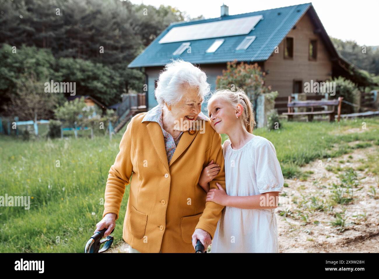 Granddaughter spending time with elderly grandma, companionship. Senior ...