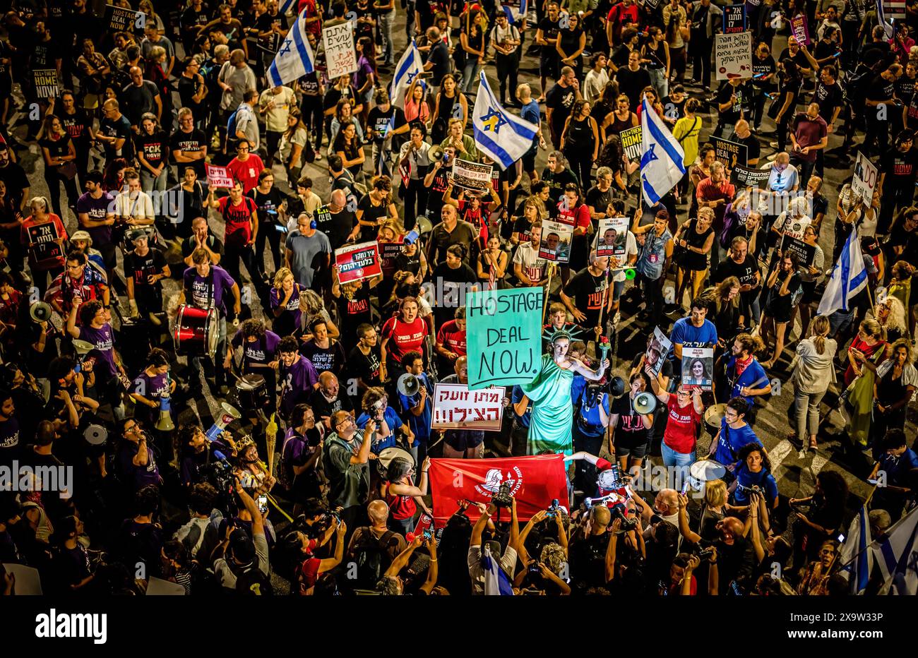 Tel Aviv, Israel. 01st June, 2024. Israeli protester holds a placard ...