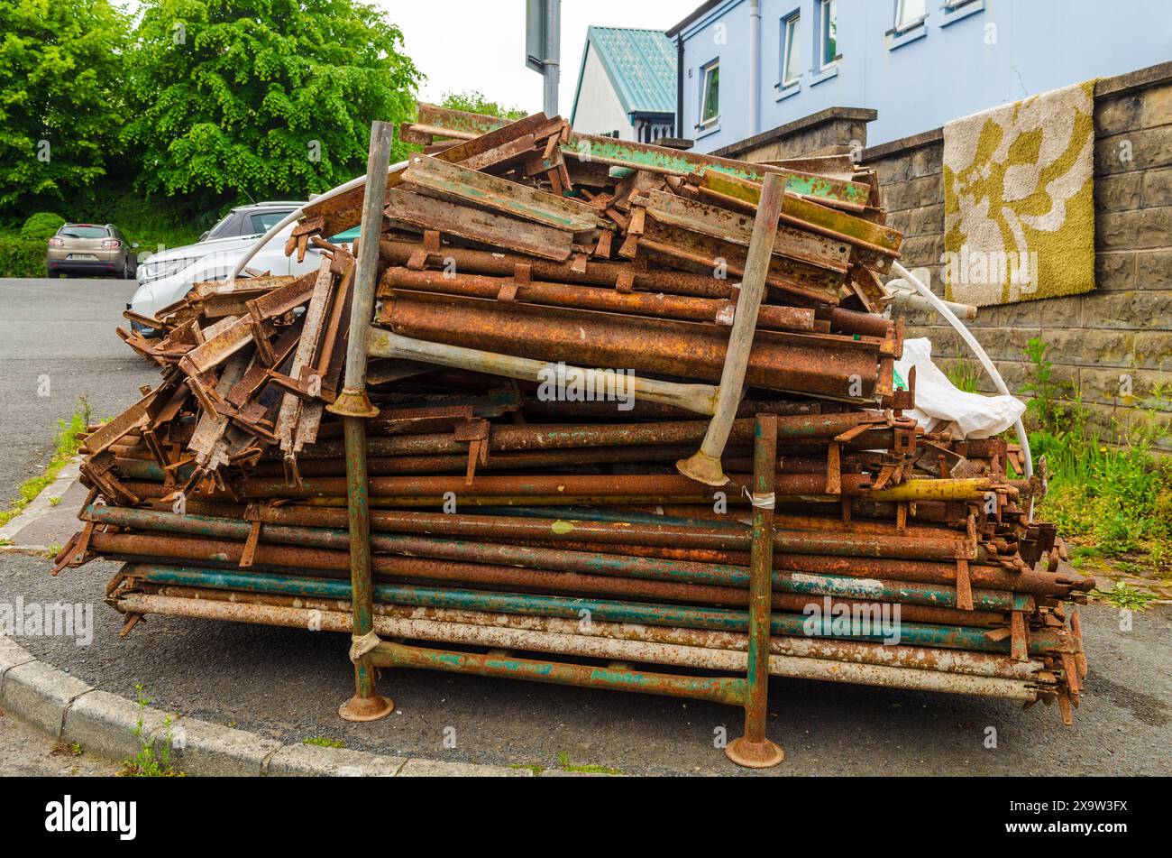 Rusted metal scaffolding piled up waiting to be dumped or recycled ...