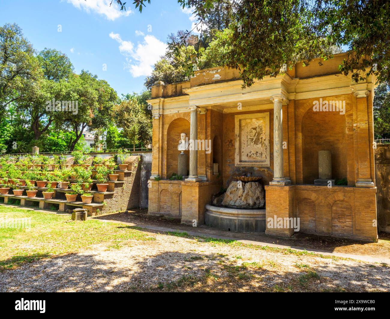 Fountain in Villa Torlonia, a park with a complex of buildings, located ...