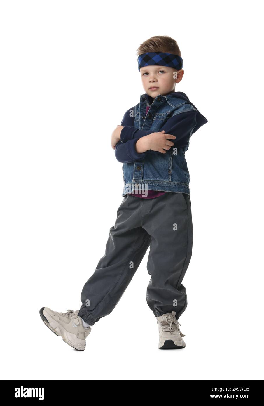 Happy little boy dancing on white background Stock Photo - Alamy
