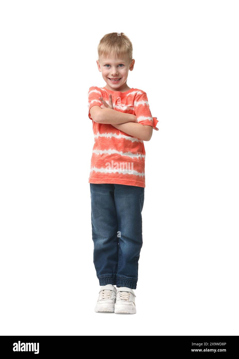 Happy little boy dancing on white background Stock Photo - Alamy