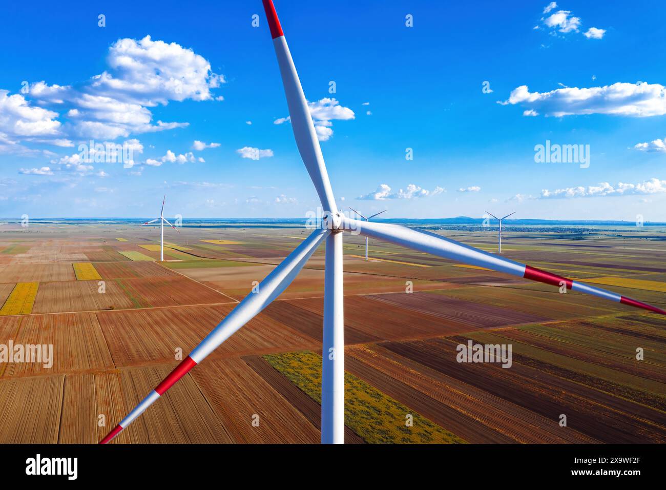 Aerial view of wind turbines on an onshore wind farm, high angle view ...