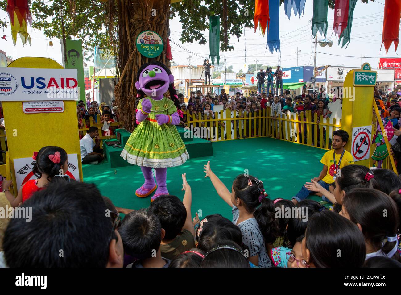 Hundreds of cheering children played with Halum, Ikri, Tuktuki and ...