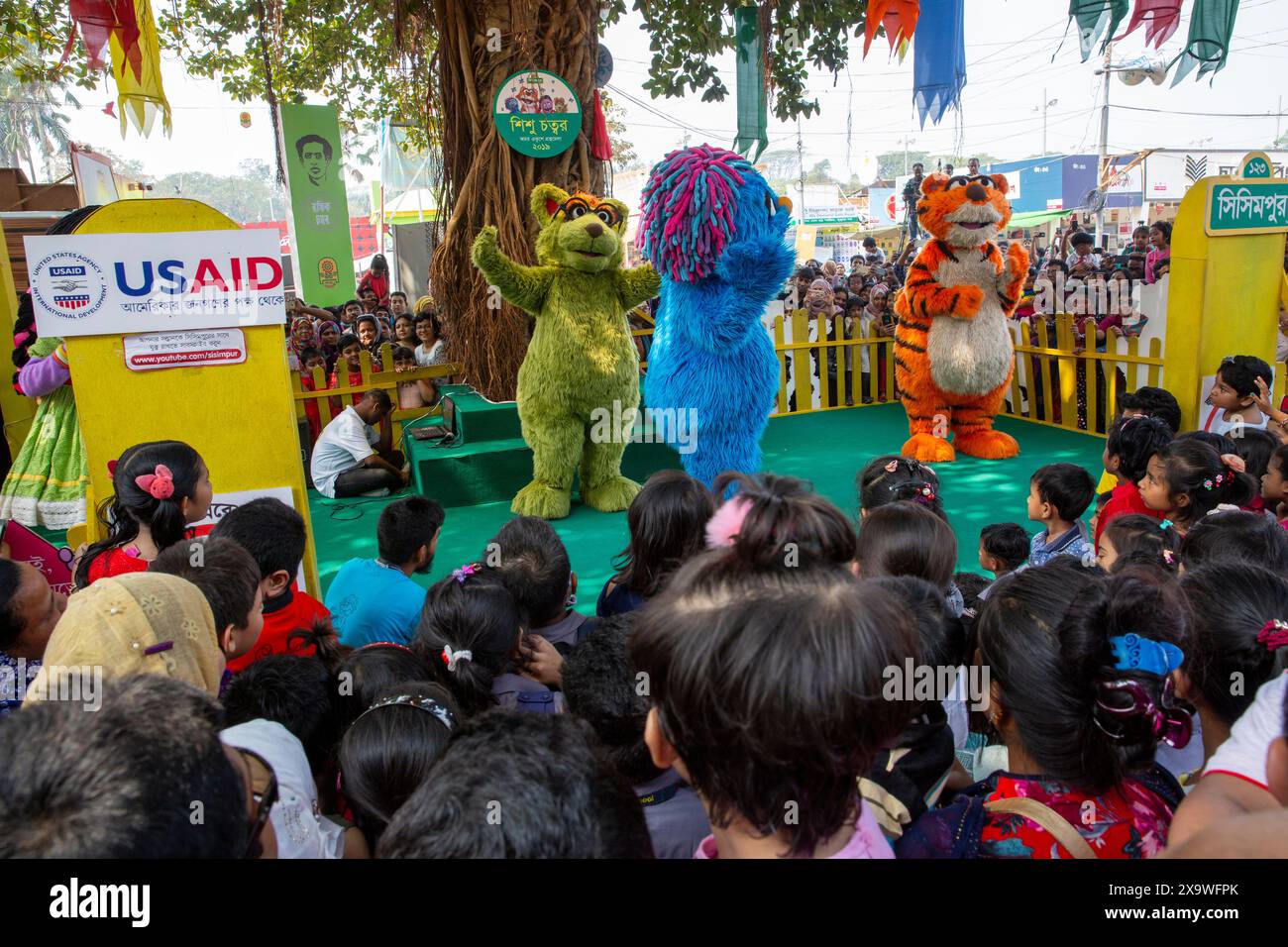 Hundreds of cheering children played with Halum, Ikri, Tuktuki and ...