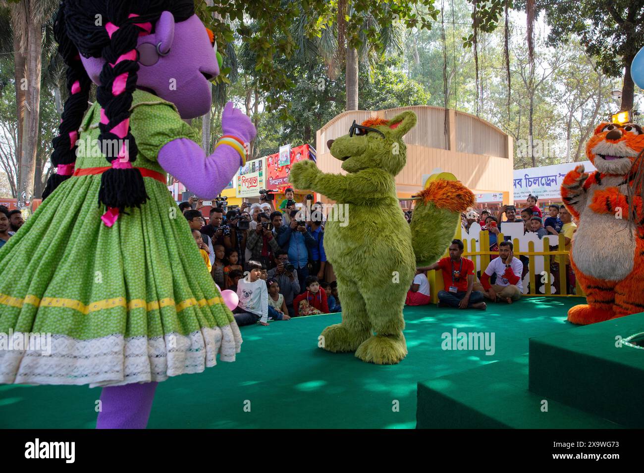 Hundreds of cheering children played with Halum, Ikri, Tuktuki and ...