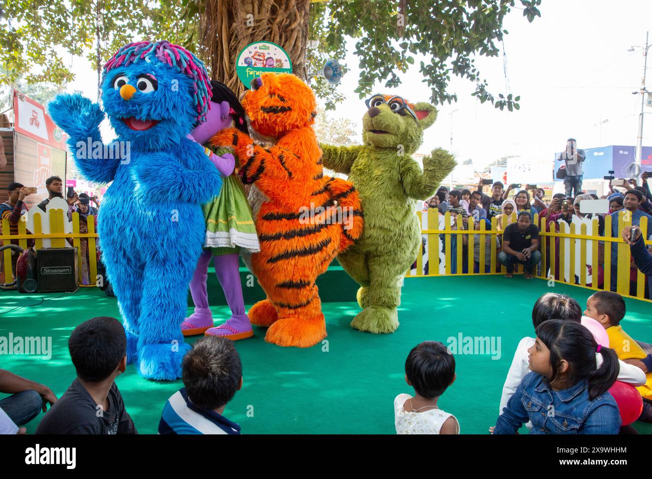 Hundreds of cheering children played with Halum, Ikri, Tuktuki and ...