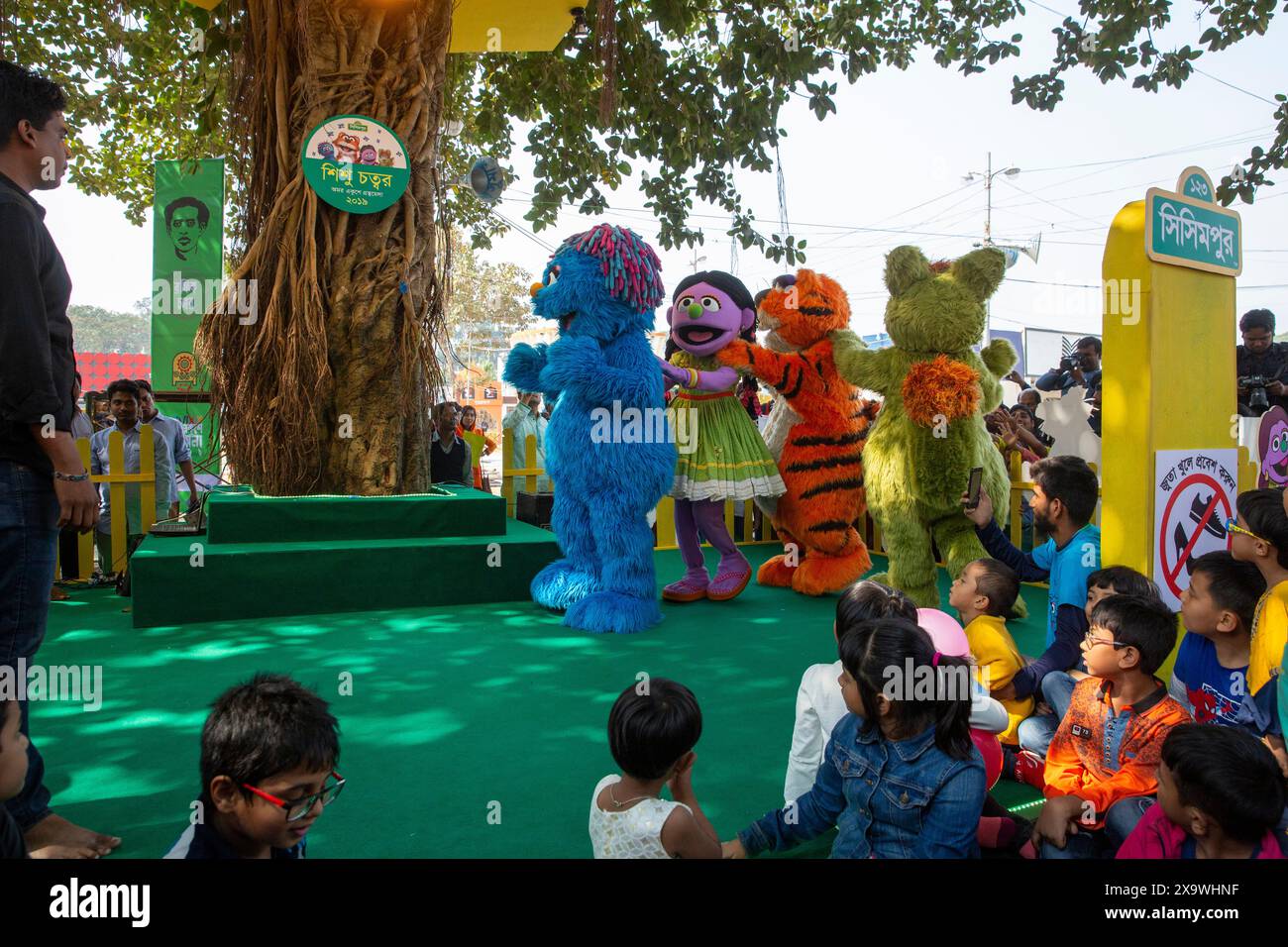 Hundreds of cheering children played with Halum, Ikri, Tuktuki and ...