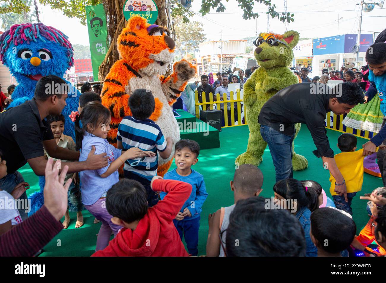 Hundreds of cheering children played with Halum, Ikri, Tuktuki and ...