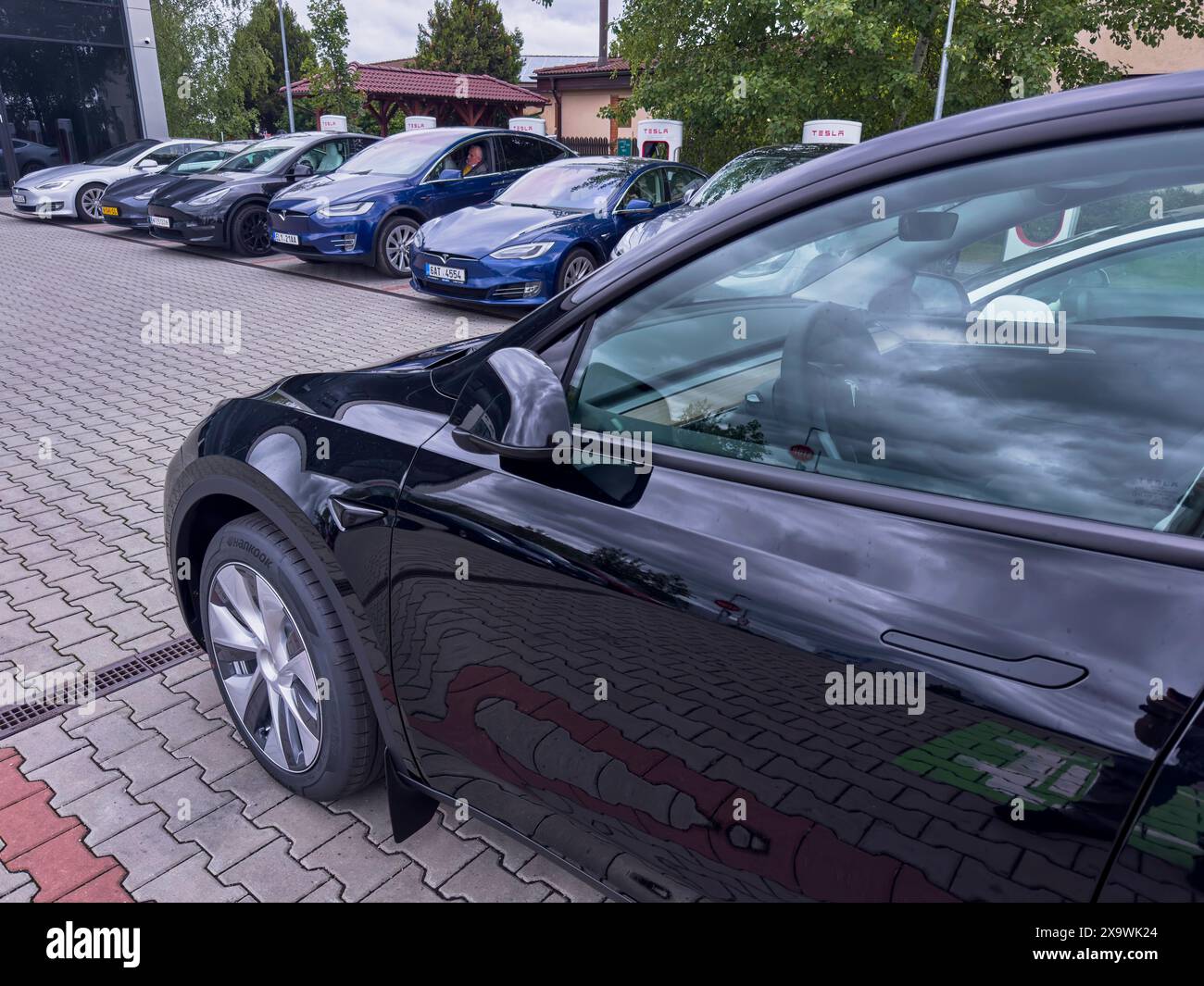 Tesla electric cars at a Tesla Super Charger power station at a highway ...
