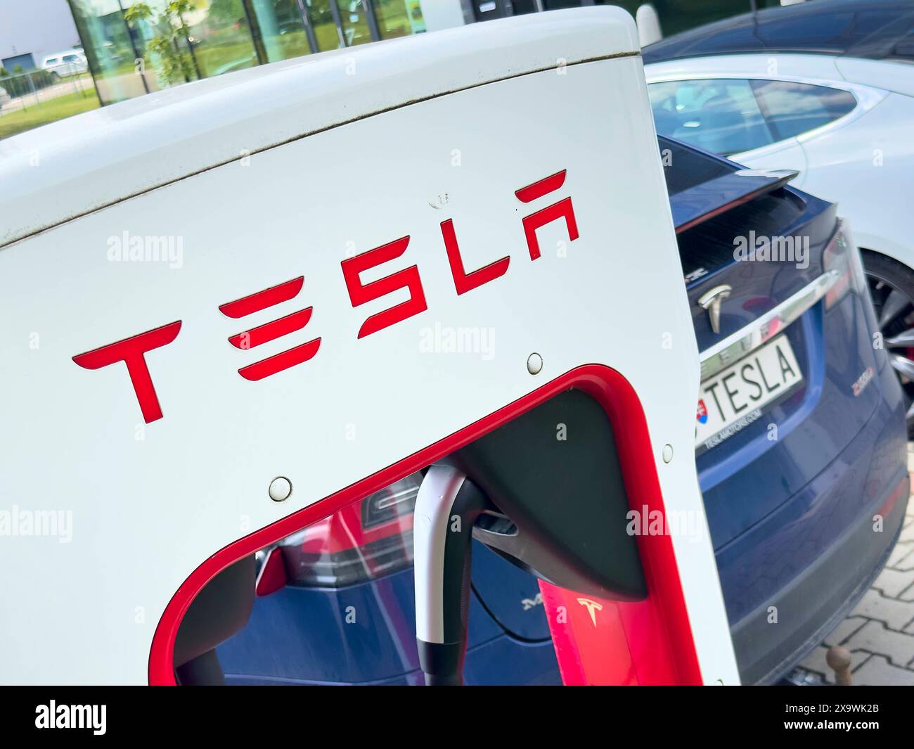 Tesla electric cars at a Tesla Super Charger power station at a highway ...