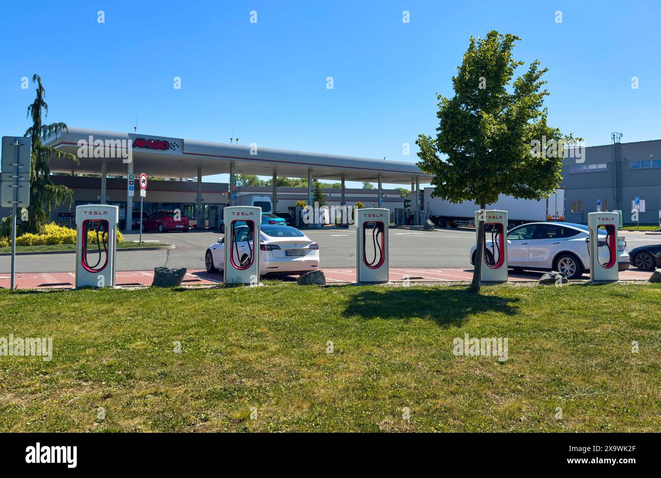 Tesla electric cars at a Tesla Super Charger power station at a highway ...