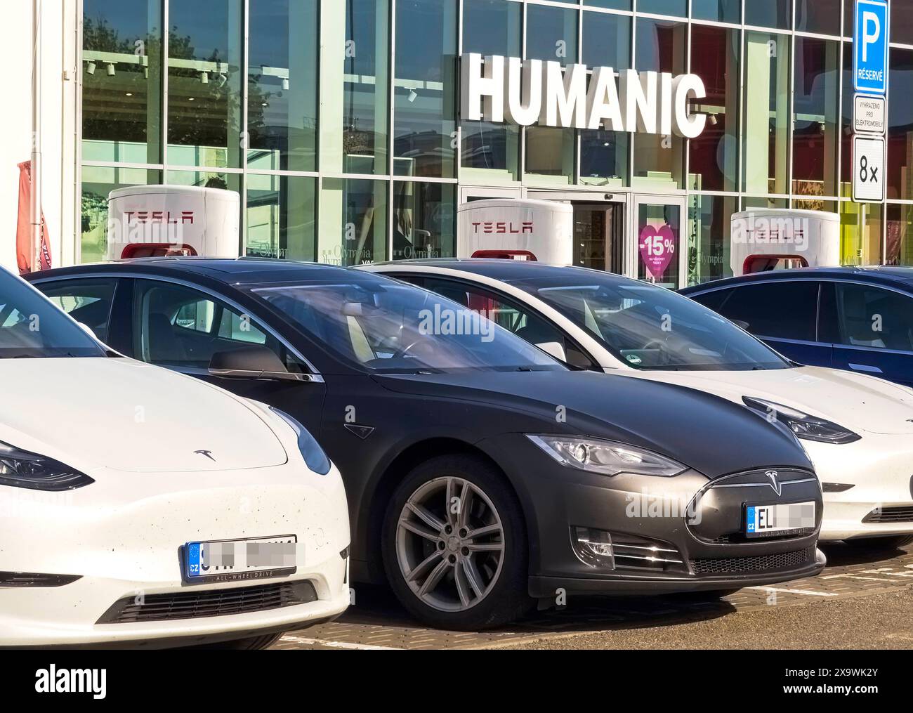 Tesla electric cars at a Tesla Super Charger power station at a ...
