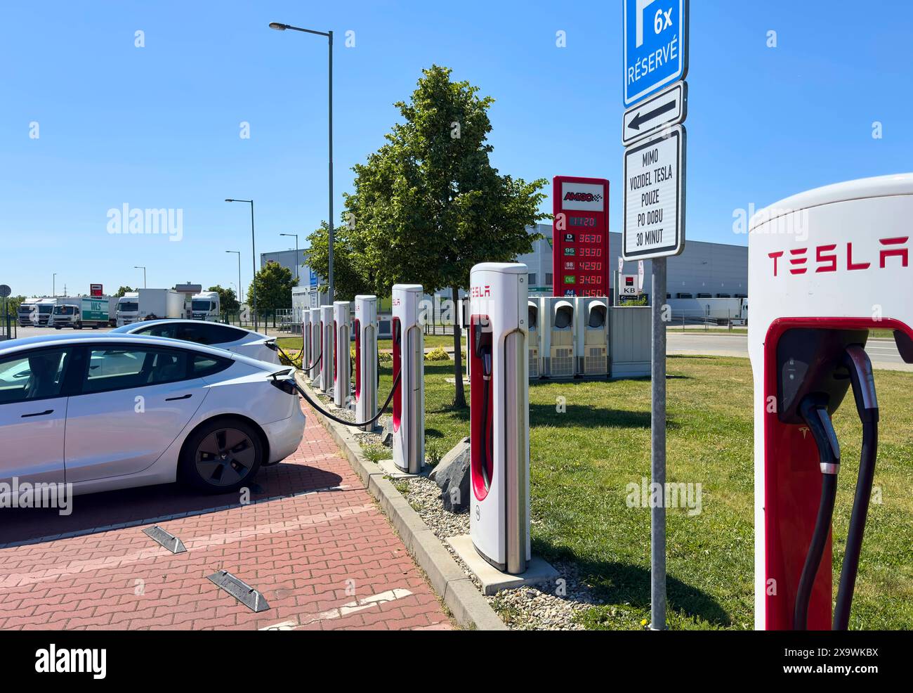 Tesla electric cars at a Tesla Super Charger power station at a highway ...