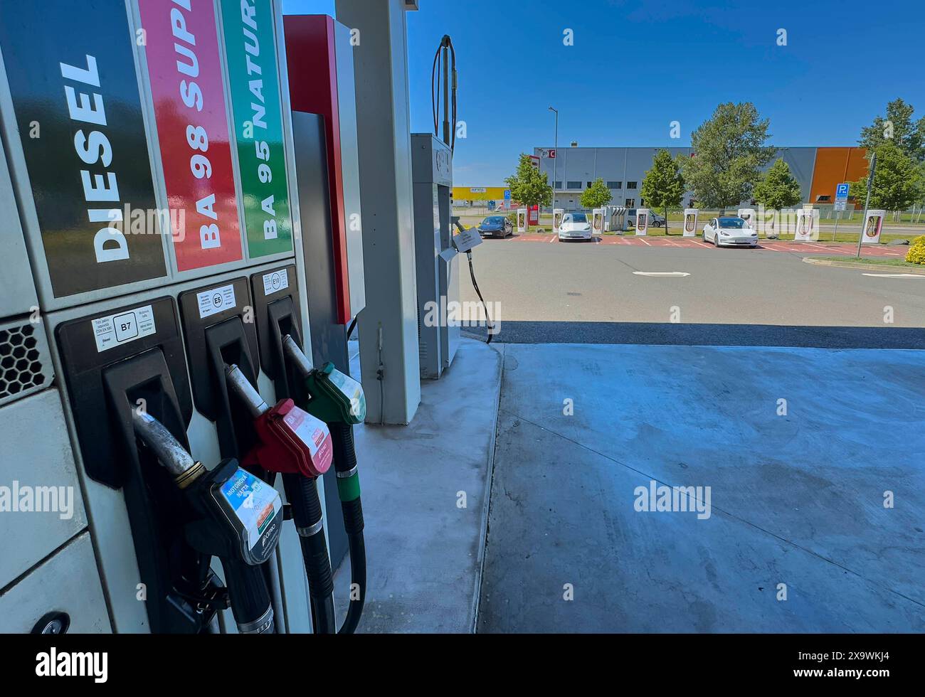 Tesla electric cars at a Tesla Super Charger power station at a highway ...