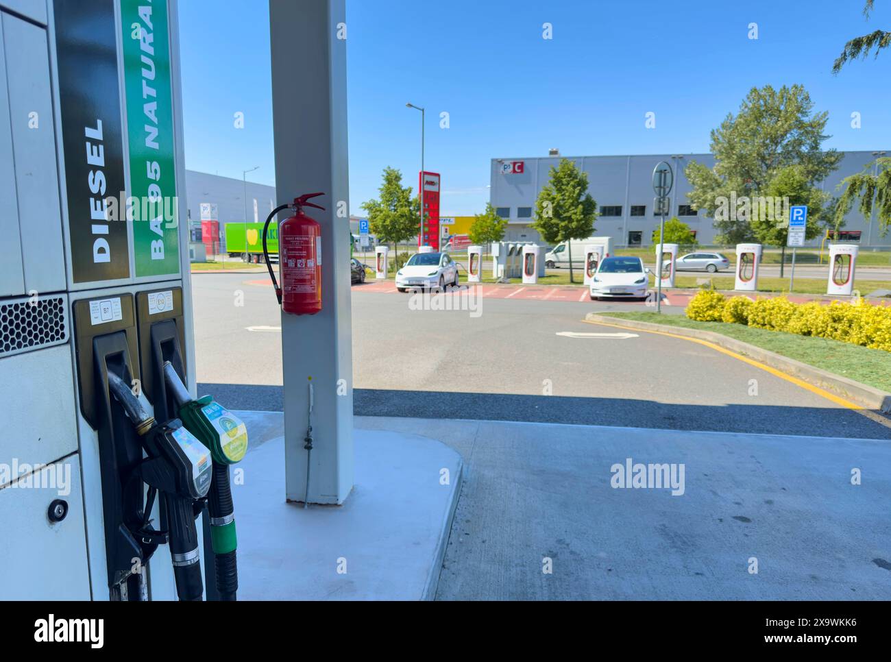 Tesla electric cars at a Tesla Super Charger power station at a highway ...