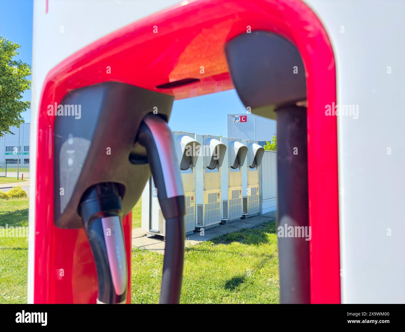 Tesla electric cars at a Tesla Super Charger power station at a highway ...