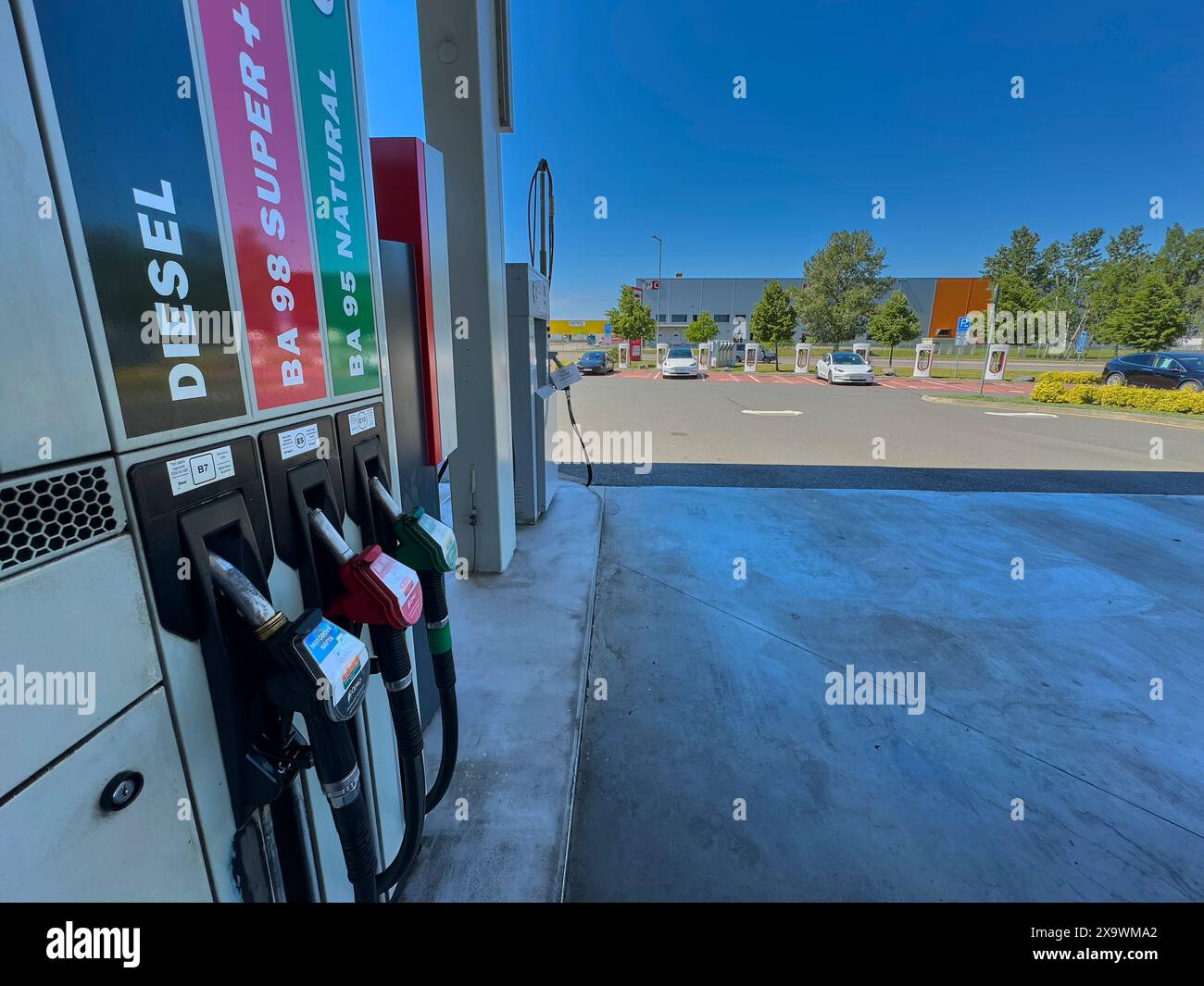 Tesla electric cars at a Tesla Super Charger power station at a highway ...