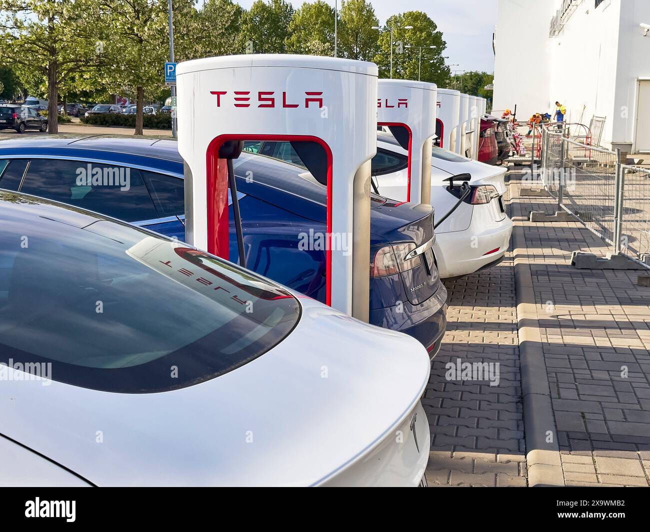 Tesla electric cars at a Tesla Super Charger power station at a ...