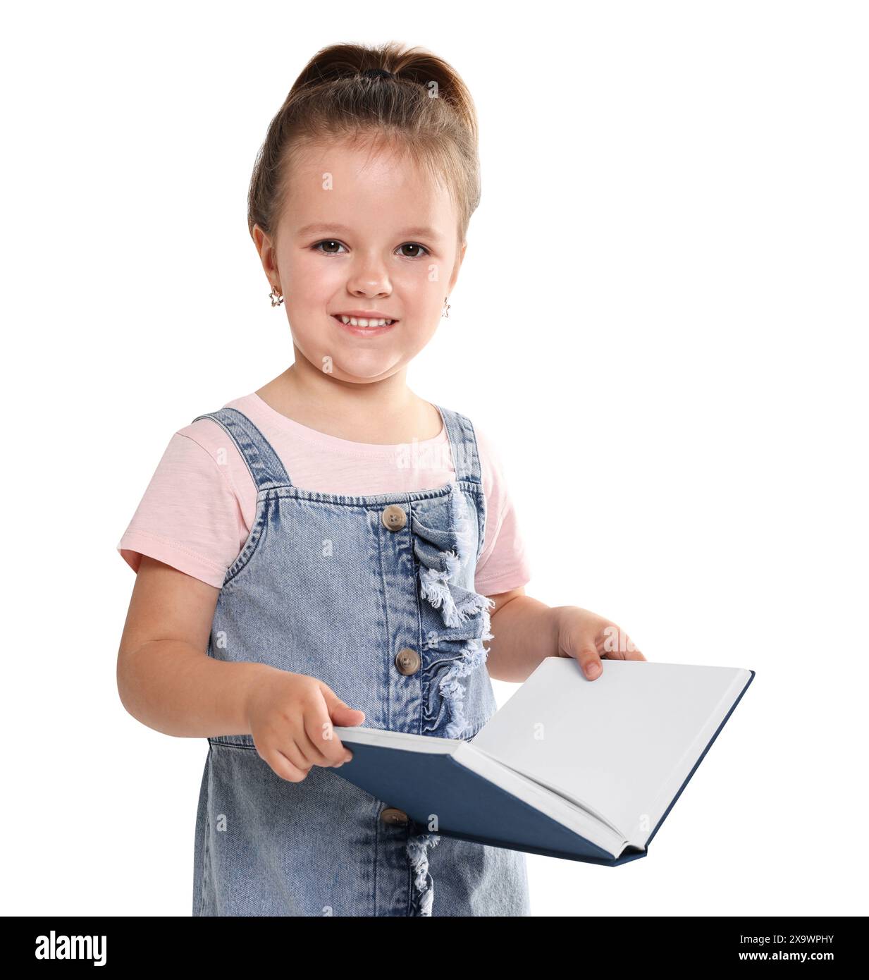 Cute little girl with book on white background Stock Photo - Alamy