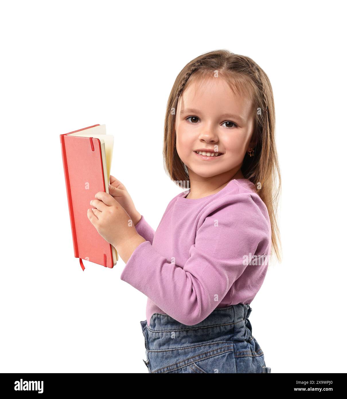 Cute little girl with book on white background Stock Photo - Alamy
