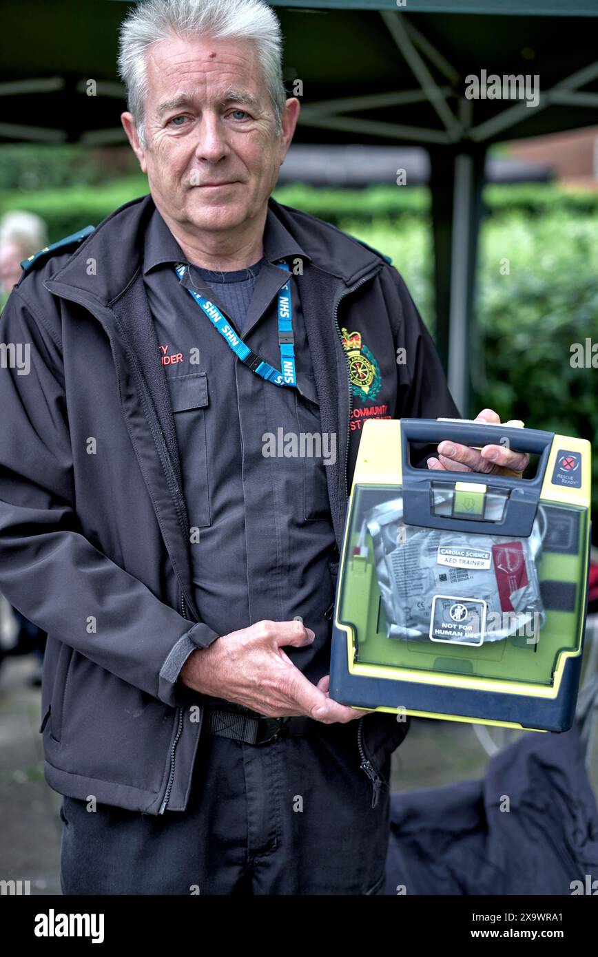 AED defibrillator, heart resuscitation electrical device displayed by a ...