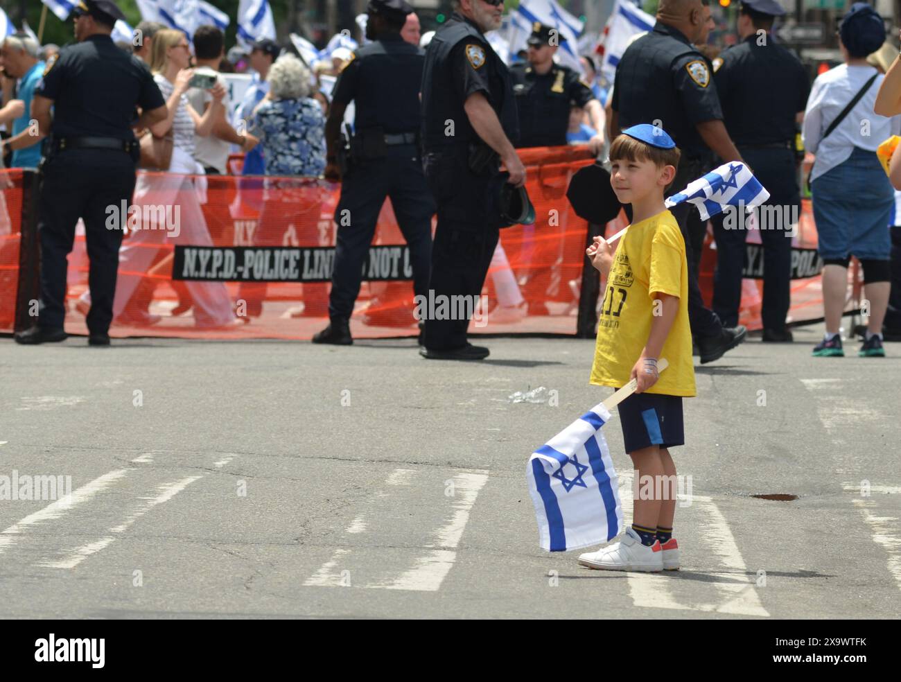 An Israeli boy is seen holding Israeli flag on Fifth Avenue in New York ...