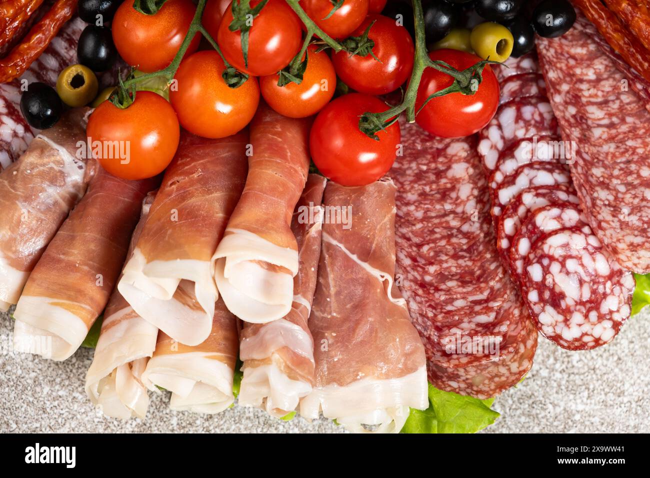 Beautiful serving of sausage sliced meat delicacies Stock Photo - Alamy