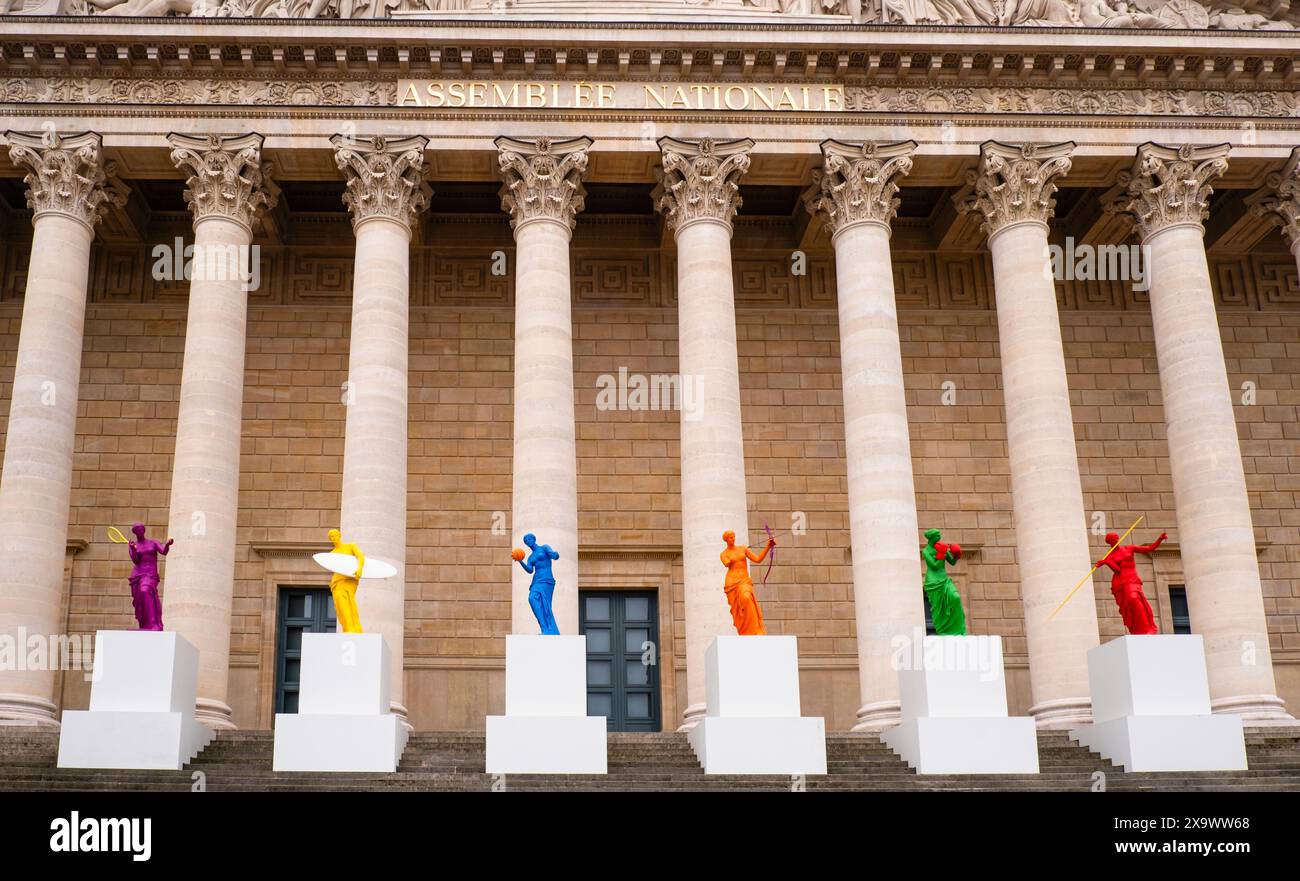 Paris, France. 3rd June, 2024. Statues with sports equipment stand in ...