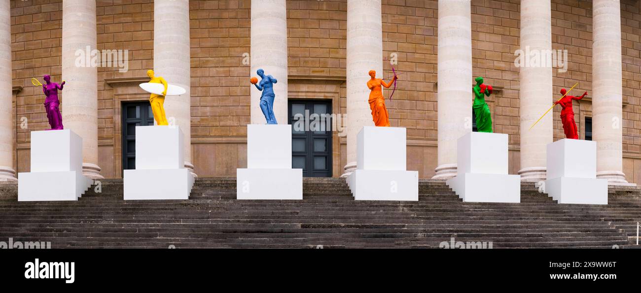 Paris, France. 3rd June, 2024. Statues with sports equipment stand in ...