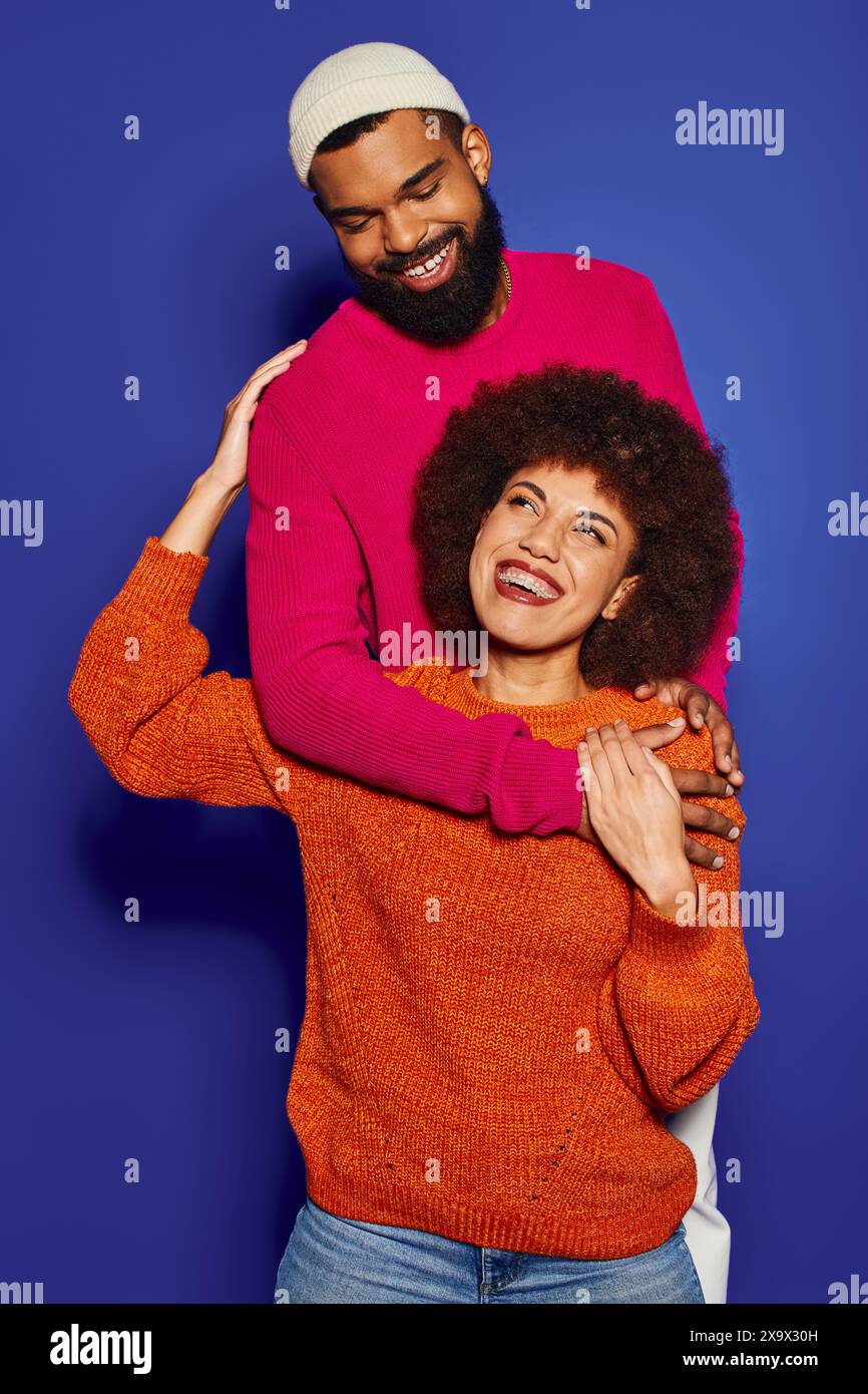 Vibrant young African American friends embrace in a warm, heartfelt hug ...