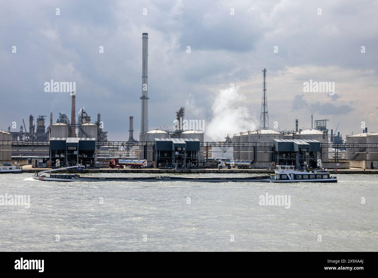A barge navigates the Port of Antwerp, Flanders, Belgium Stock Photo ...