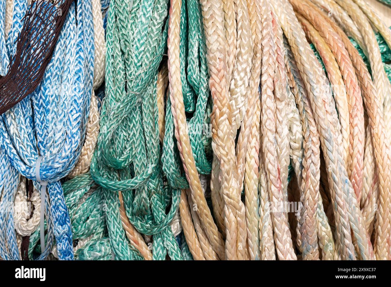 Assorted Group of recycled plastic ropes background. Full frame Stock ...