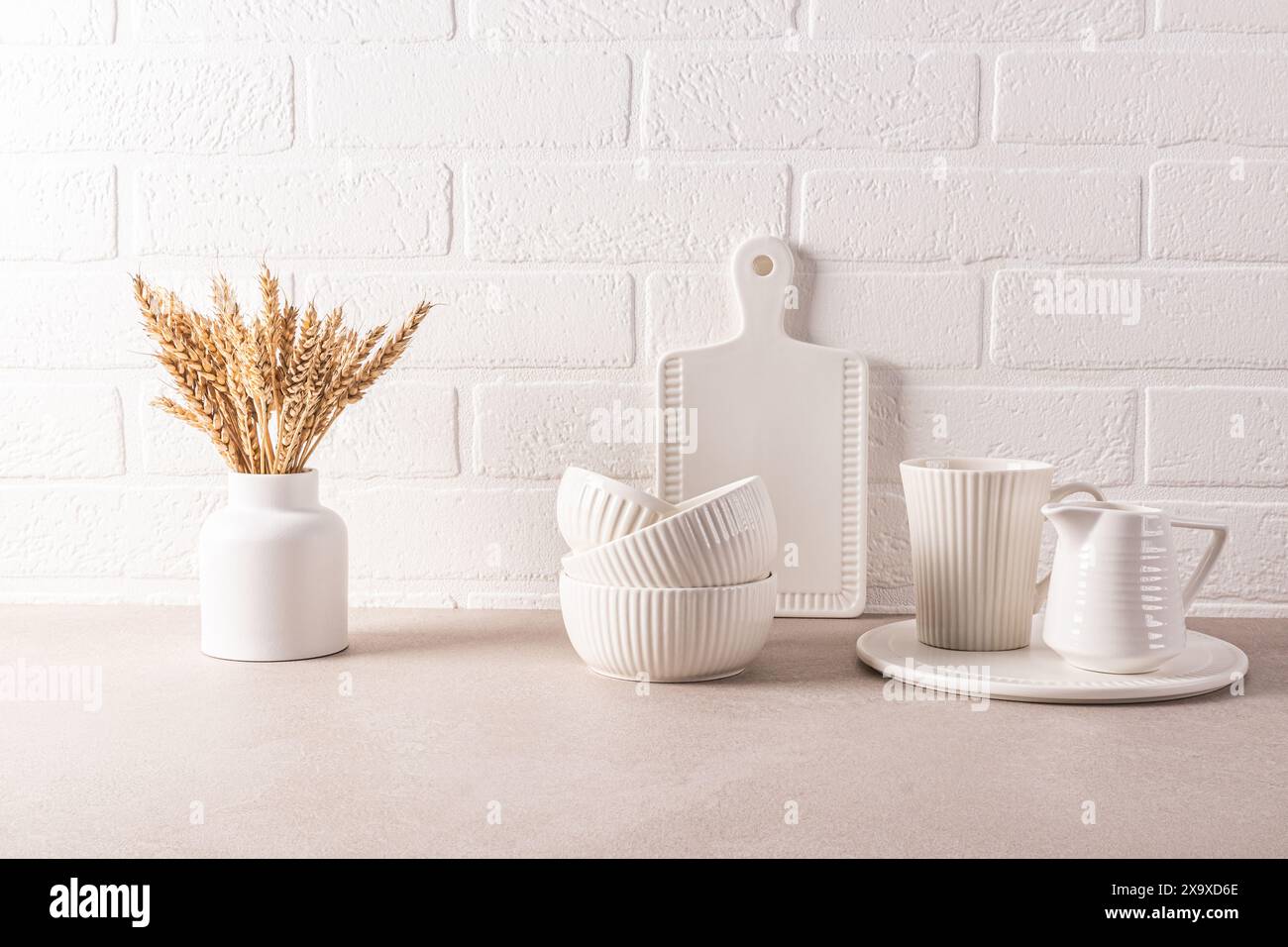 Stylish kitchen background in a minimalist style. White ceramic kitchen ...