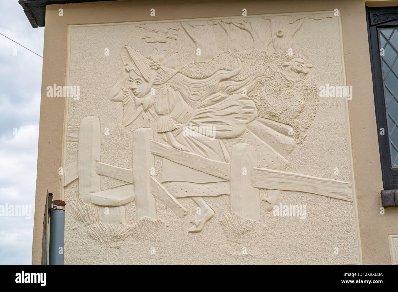 Nursery rhyme themed pargeting on house in Blackmore, Essex Stock Photo ...