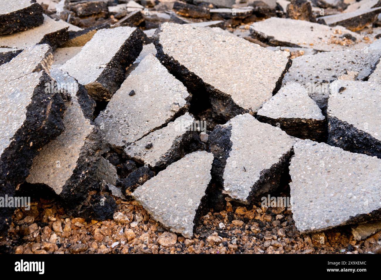 Broken concrete on the street Stock Photo - Alamy