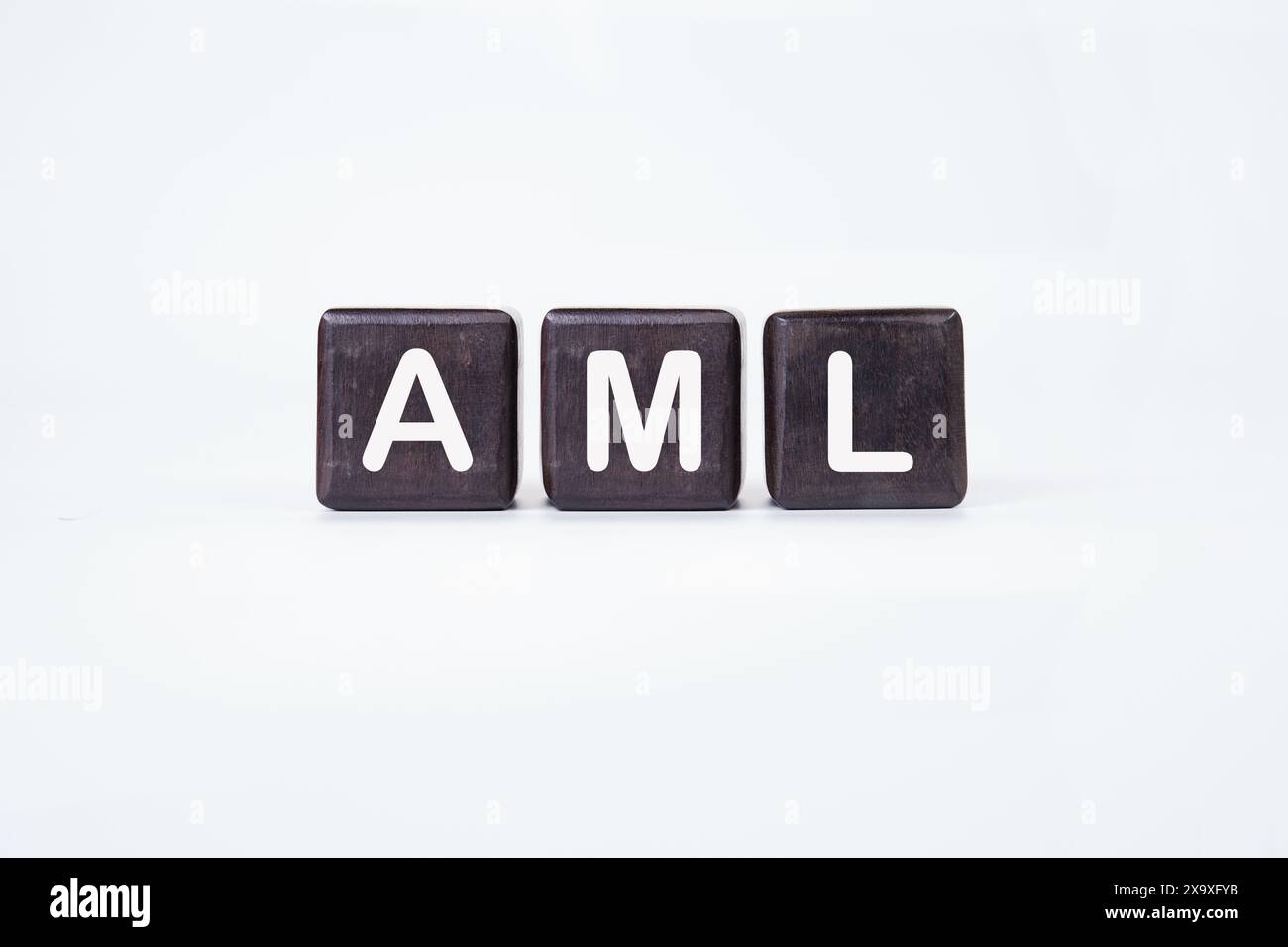 Business concept. AML word on dark cubes on a light background Stock ...