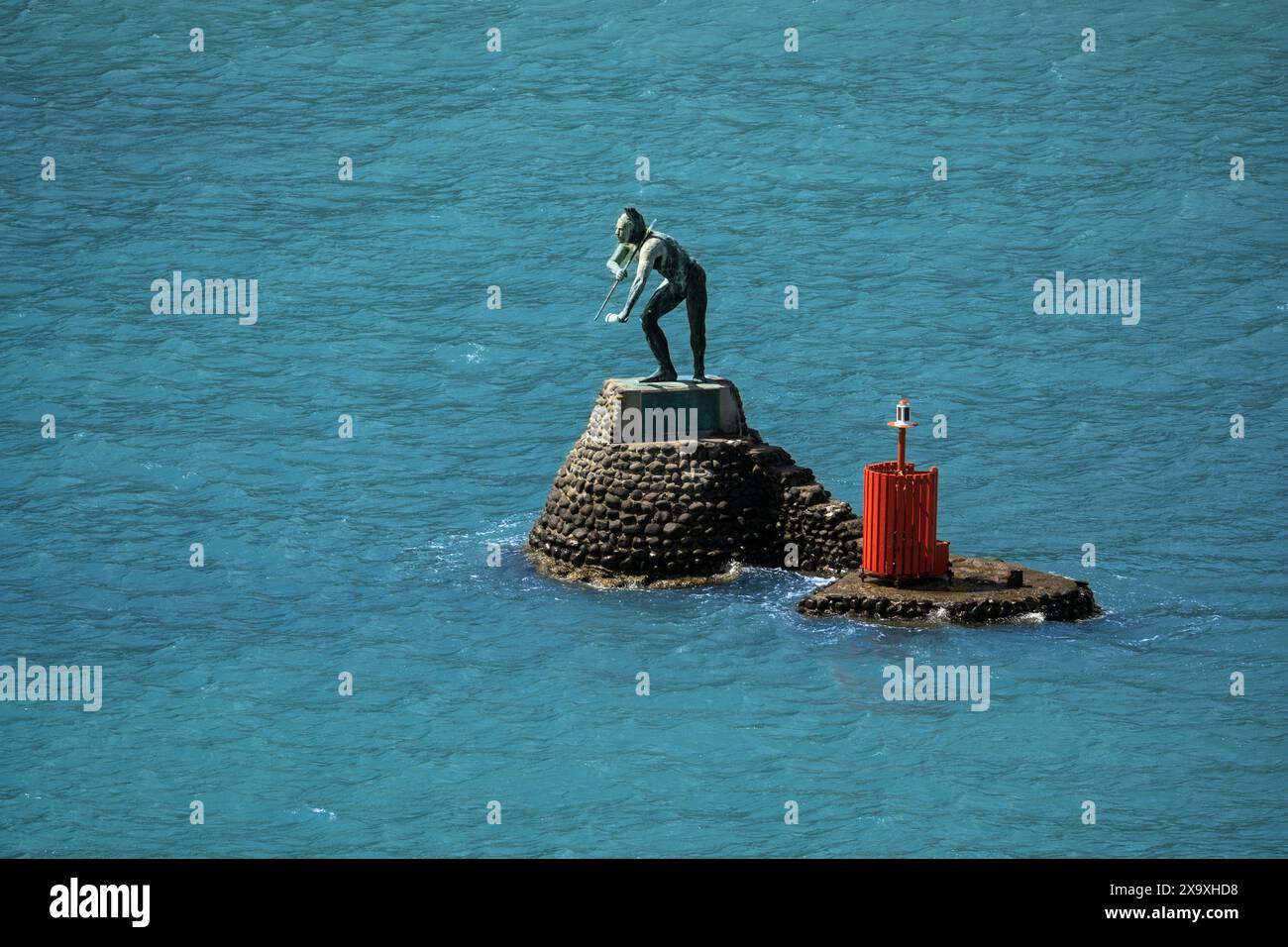The statue of Tangaroa at the entrance to Tangaroa harbour Stock Photo ...