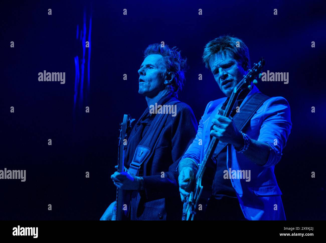 Bassist John Taylor and guitarist Dominic Brown of British band Duran ...