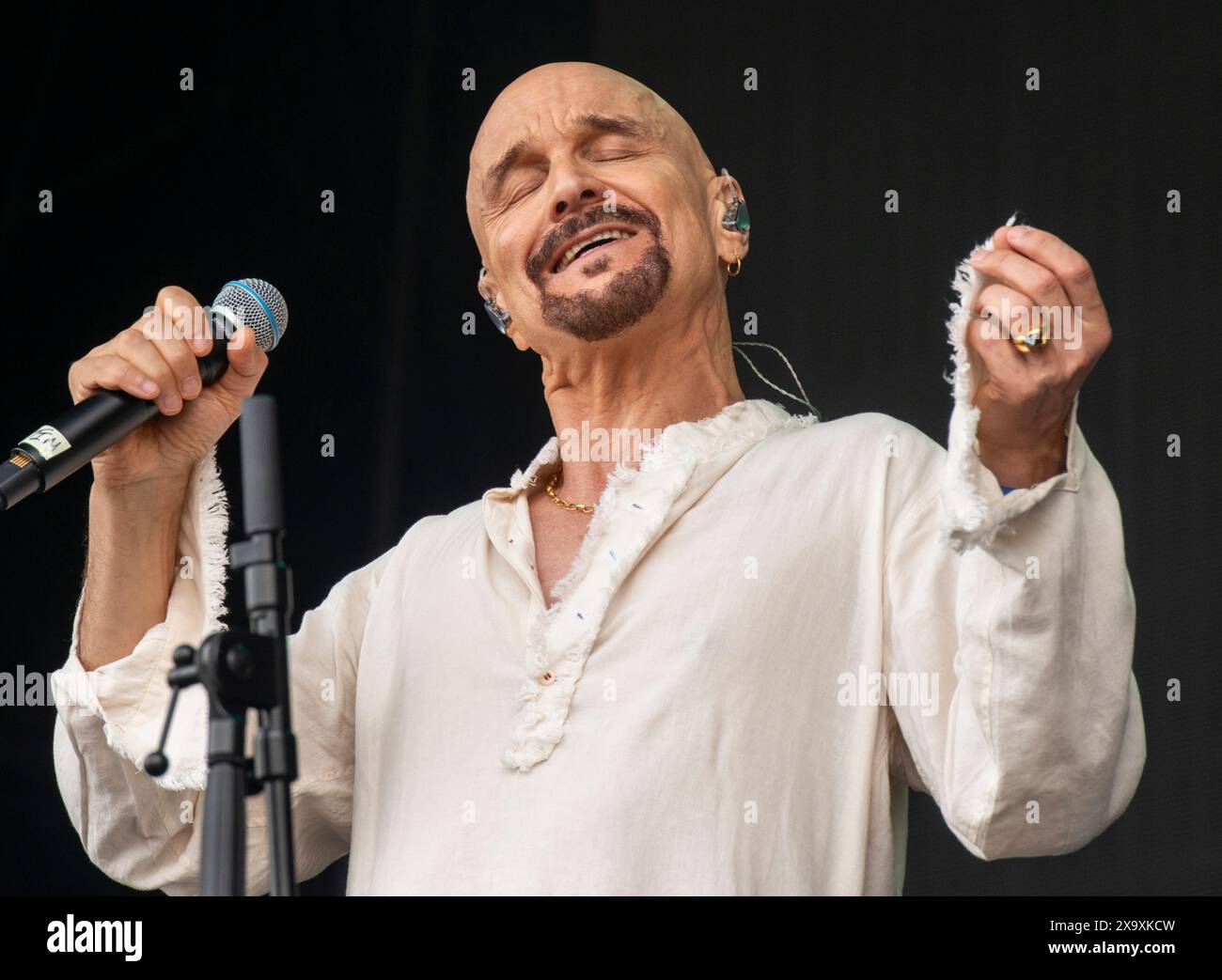 Tim Booth and his band James playing an orchestral and choral set live ...