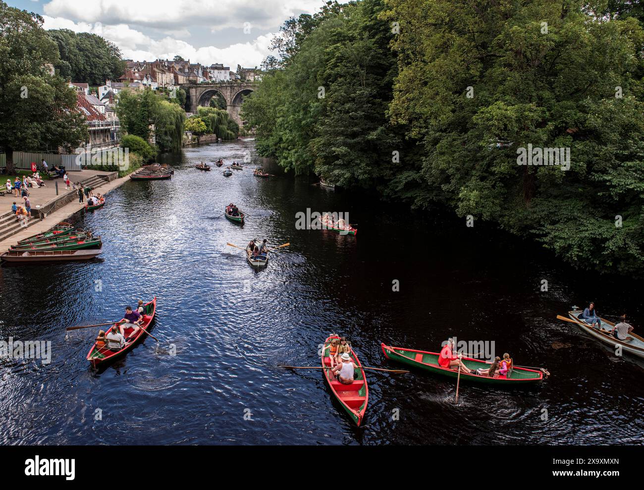 People are enjoying the sunshine riding boats on the river Nidd in ...