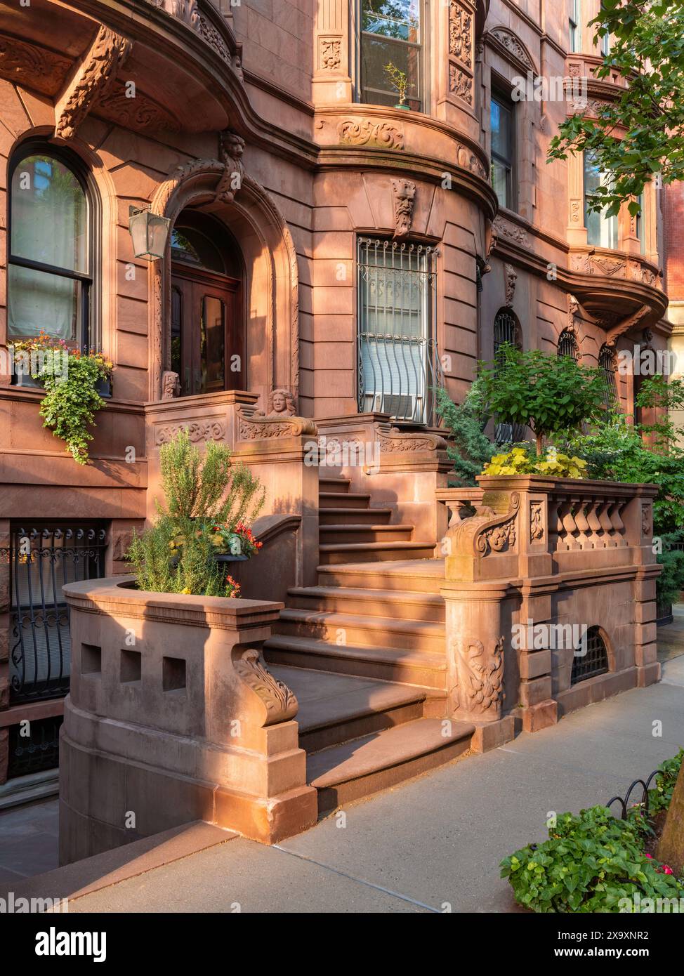 Iconic brownstones in New York City's Upper West Side, Manhattan. This row of houses is located ...
