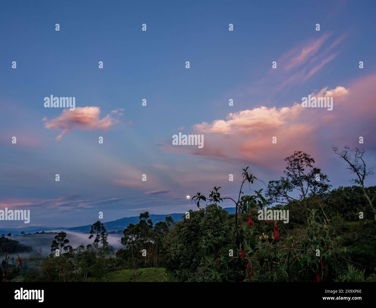 Panoramic view of the beautiful full moon setting over the eastern ...