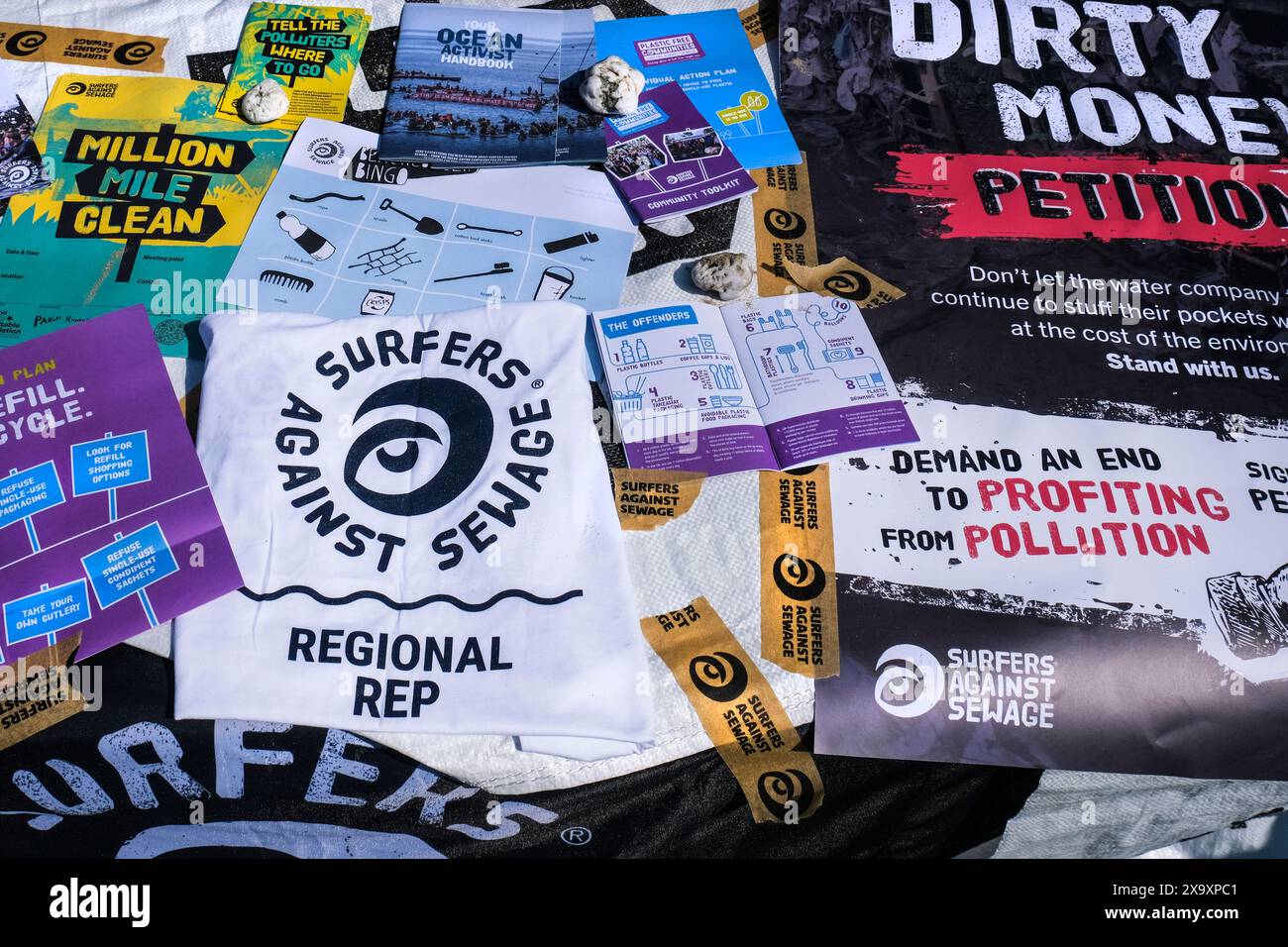 Information leaflets and posters concerning pollution on a table in ...
