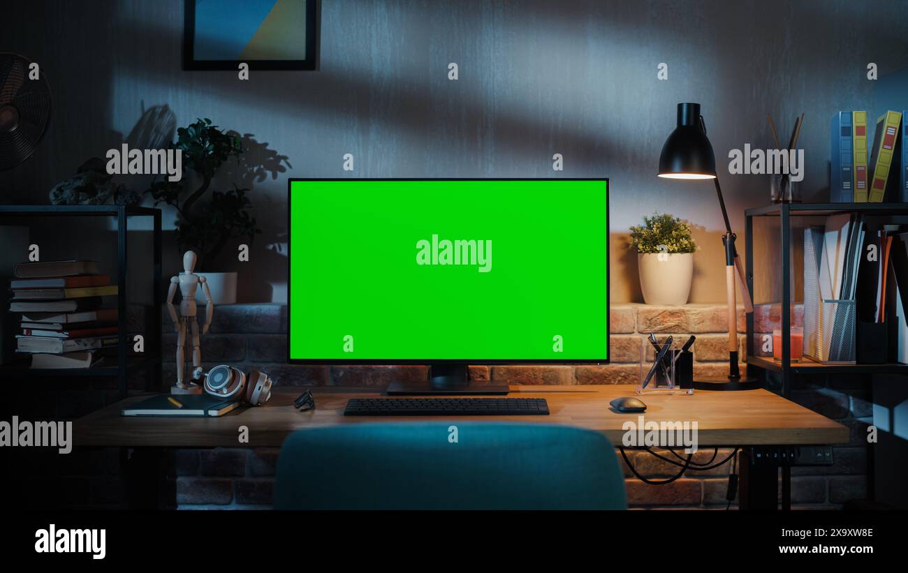 Desktop Computer Monitor with Mock Up Green Screen Standing on a Wooden ...
