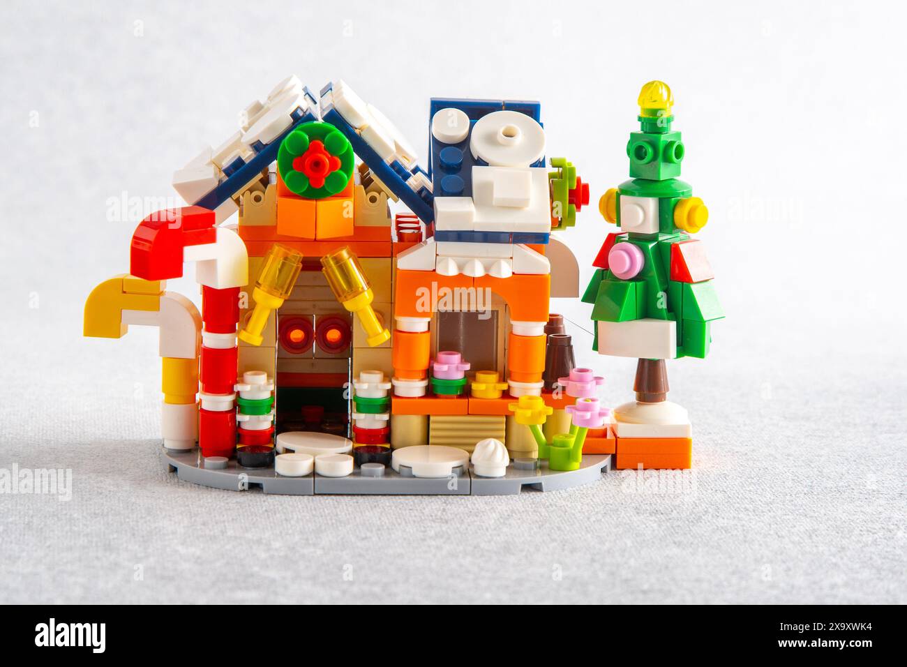 Christmas tree and Santa Claus house toy. Lego constructor from mini ...